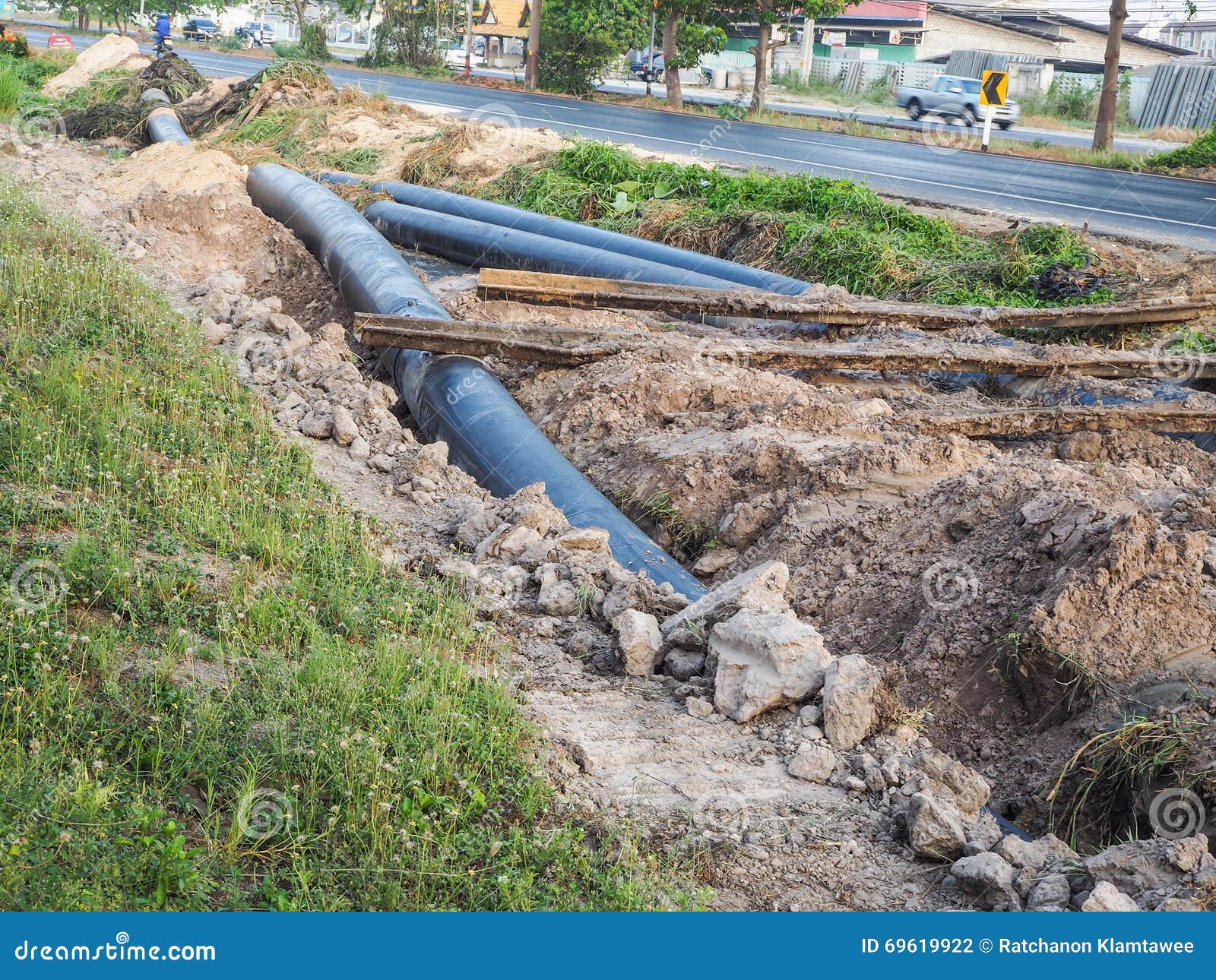 Work laying tubes. stock photo. Image of excavator, time - 69619922