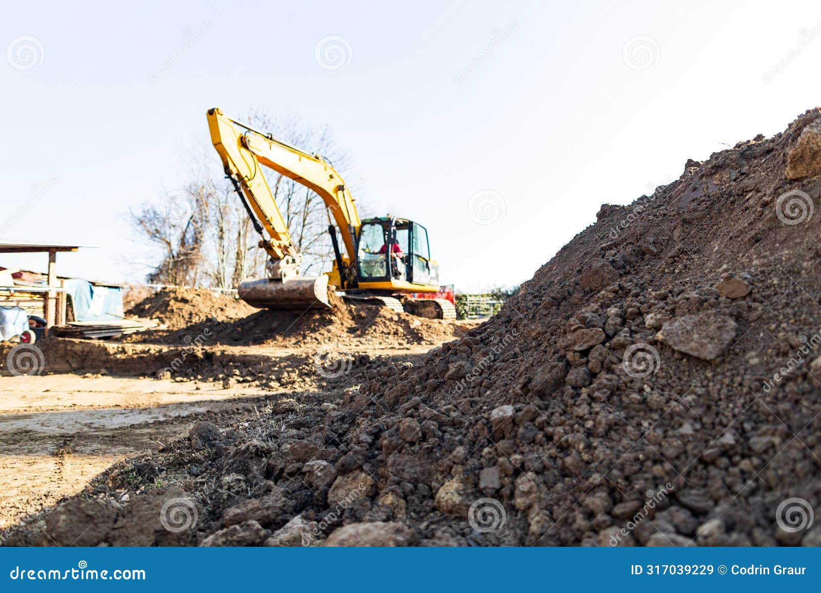 Escavator at Work on Construction Site Stock Image - Image of excavation, activity: 317039229