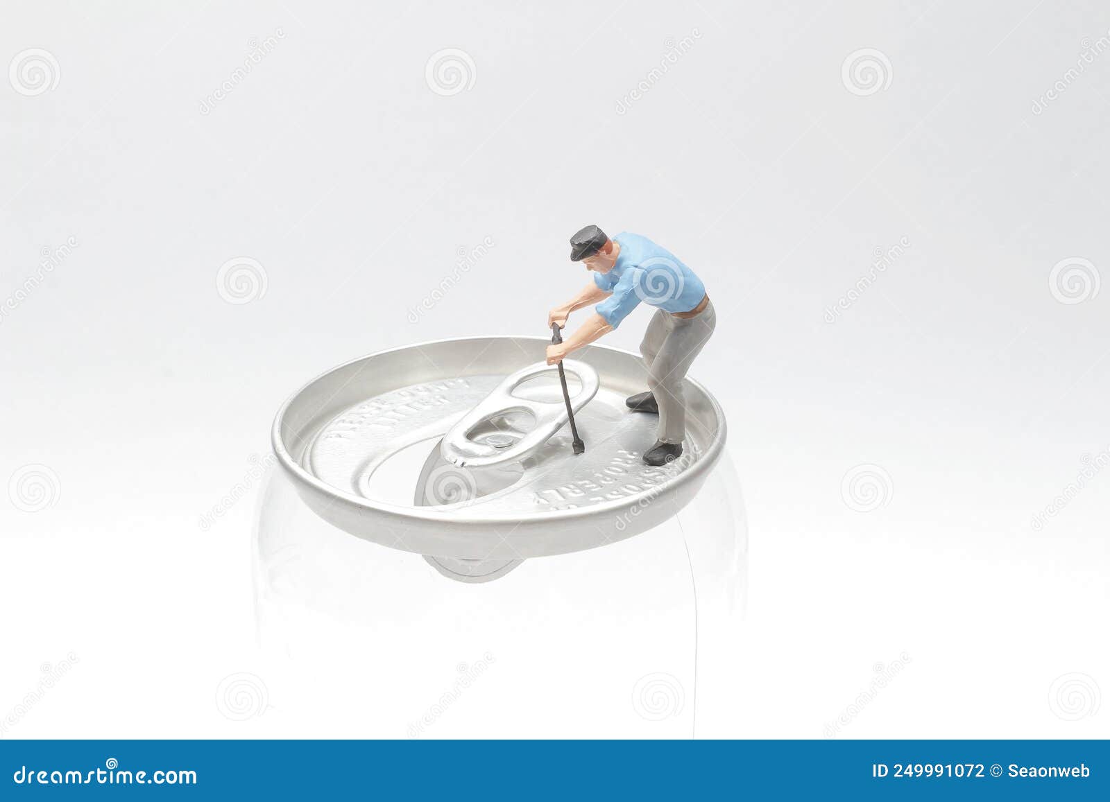 Work Man Open a Can. Mini Workman on Top of Soda Stock Photo - Image of ...