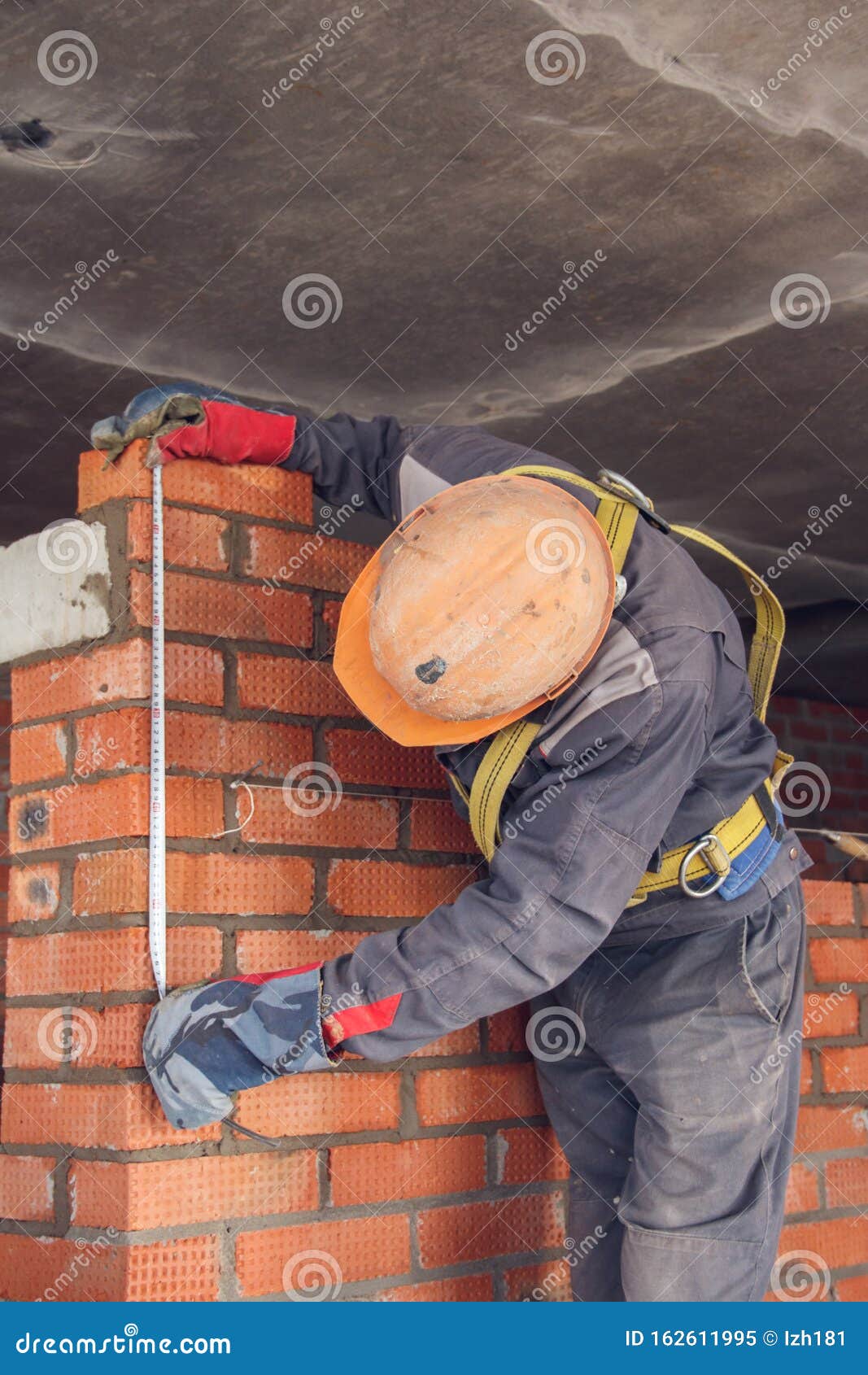 Work Mason at Work. Masonry Walls Made of Red Brick Stock Image - Image ...
