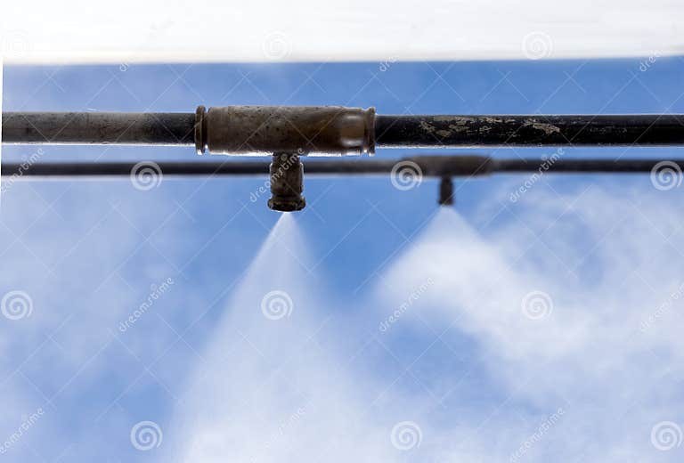 The Work of the New Cooling System with Water Mist Stock Image - Image ...