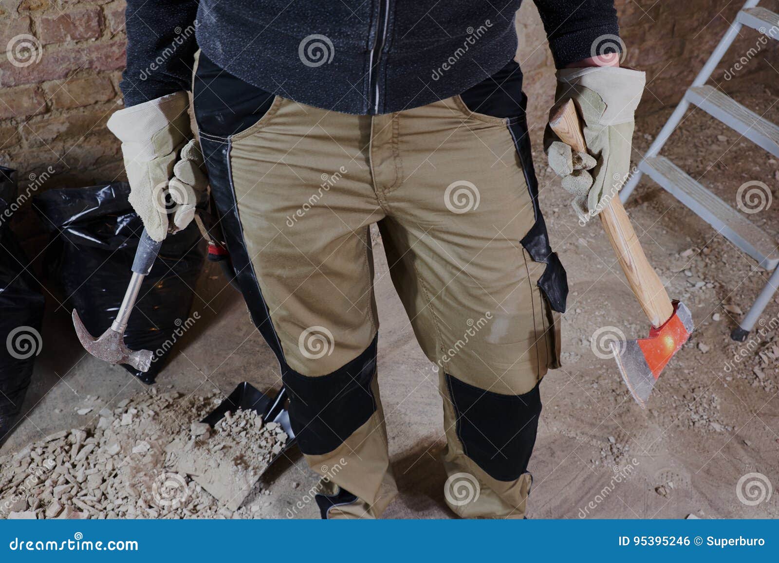 Work Person Holding Tools with Construstion in the Background Stock ...