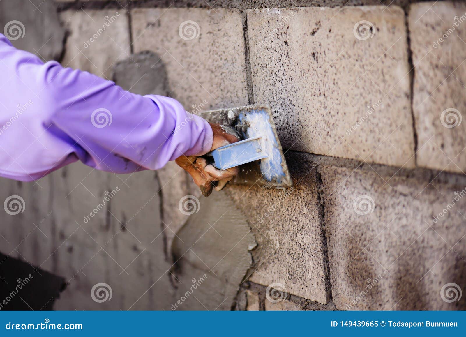 The Work of a Plasterer by Applying Plaster To the Wall To Have a ...