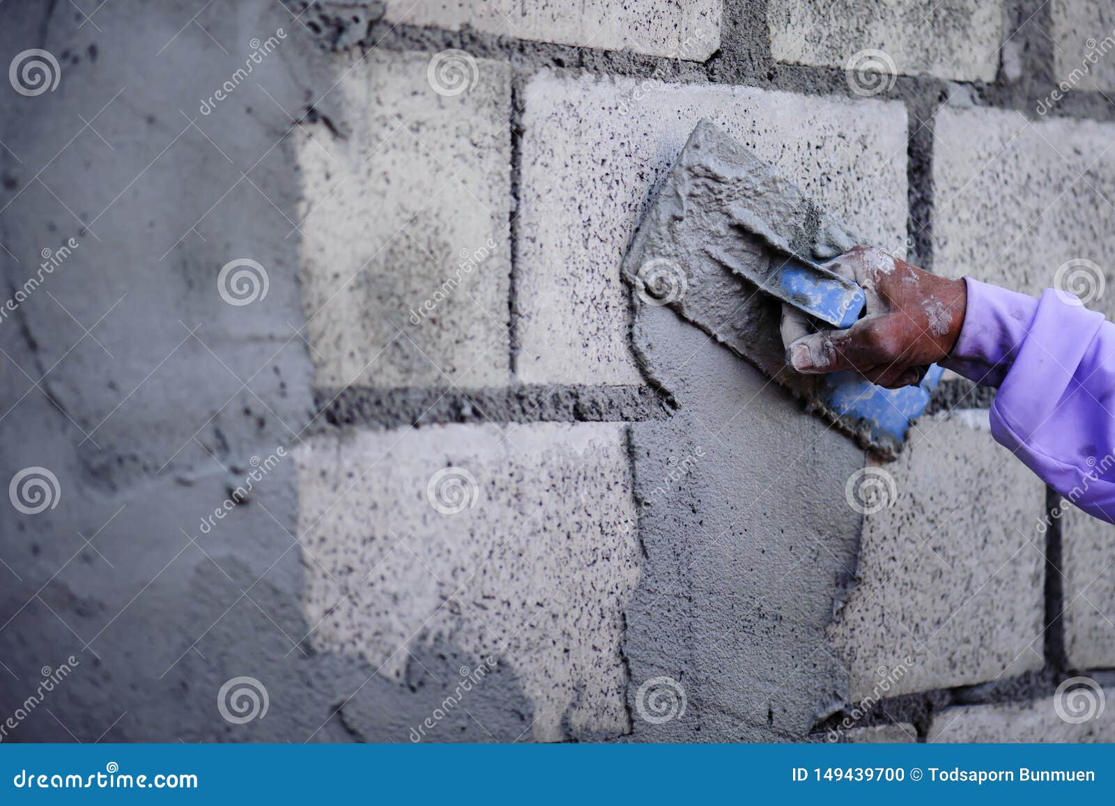 The Work of a Plasterer by Applying Plaster To the Wall To Have a ...