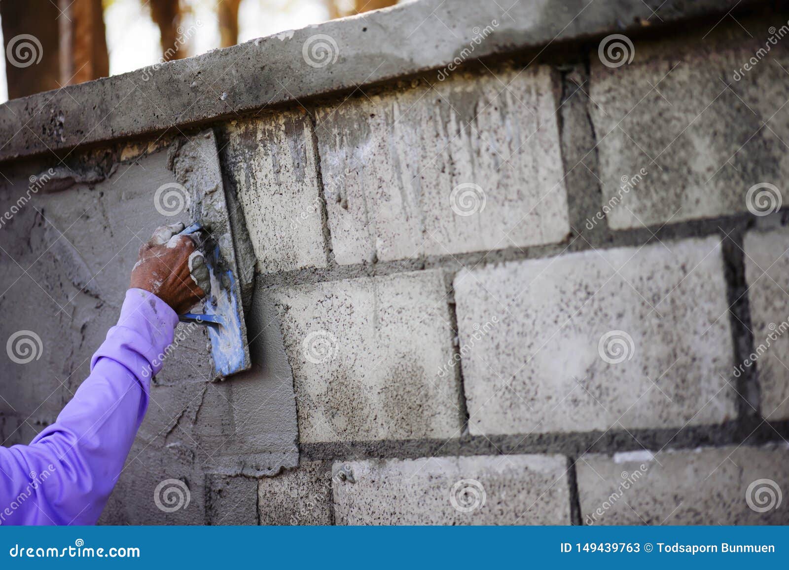 The Work of a Plasterer by Applying Plaster To the Wall To Have a ...