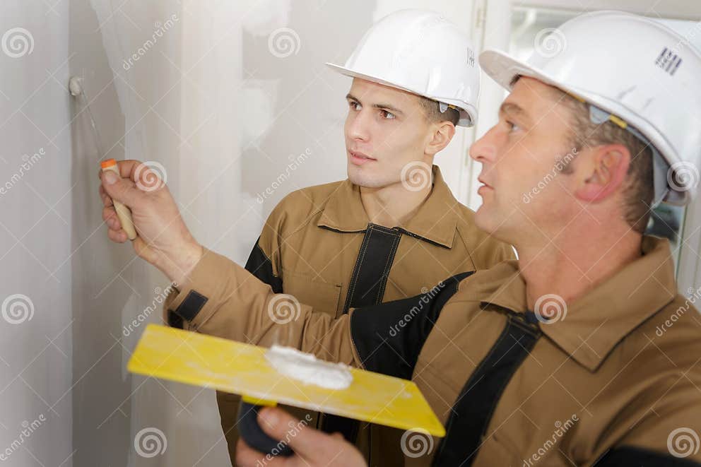 Work Plasterer Painter Learning To Make Repairs Stock Photo - Image of industrial, finishing ...