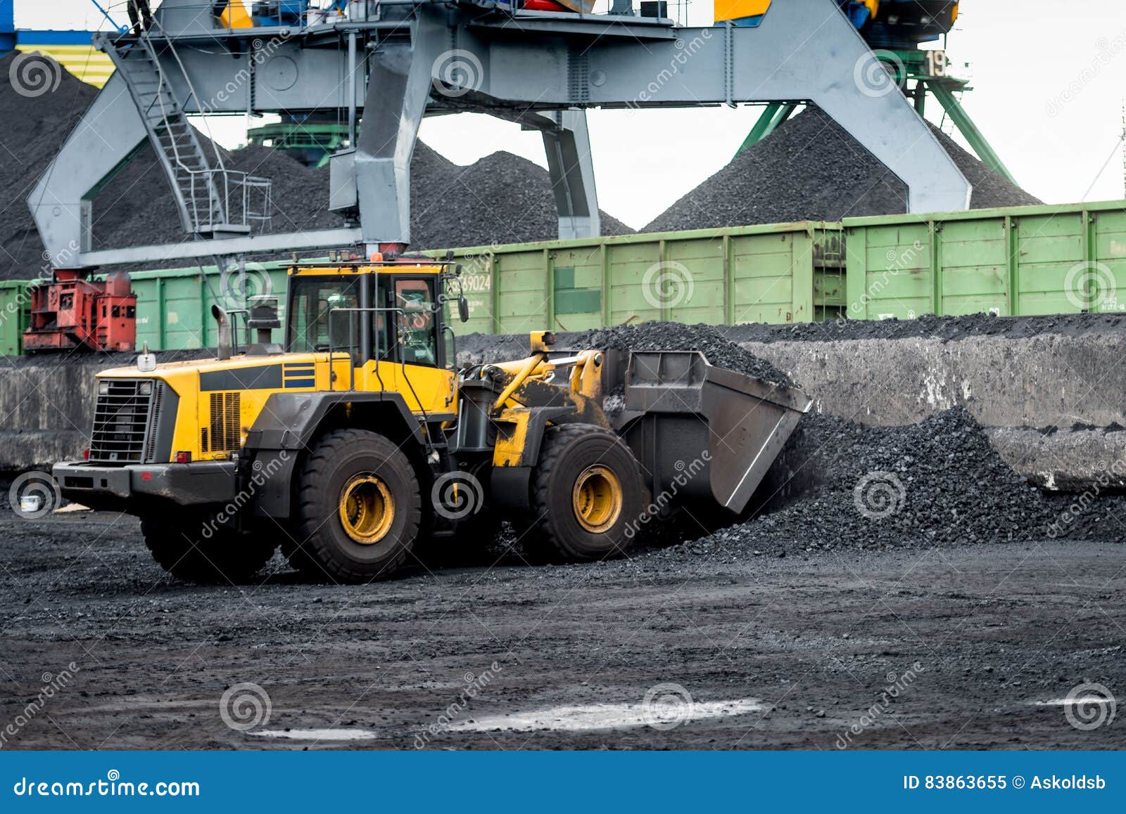 Coal Handling Terminal And Storage With Windmills In The Background ...