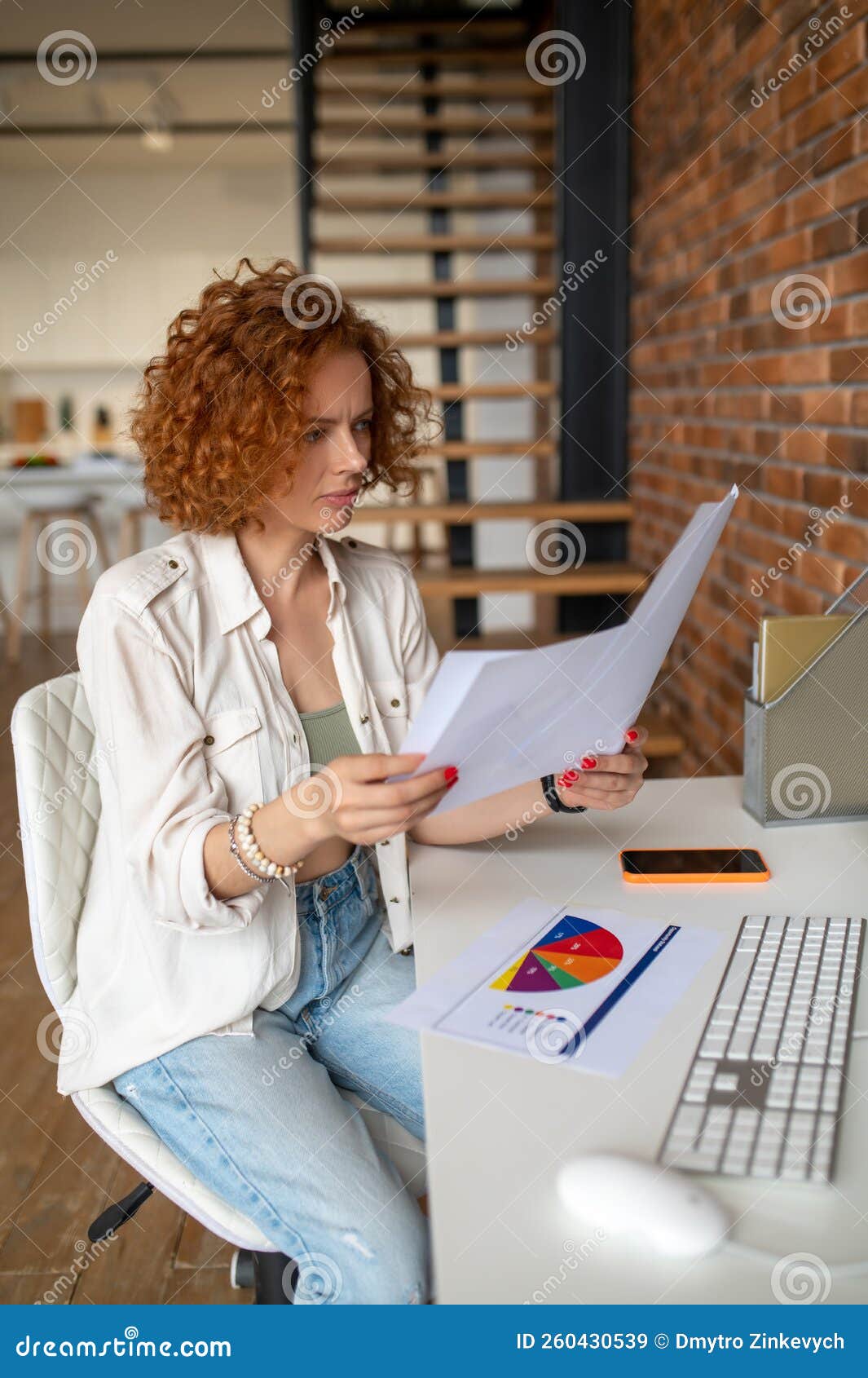 Female Manager Scrutinizing Papers and Looking Involved Stock Image ...