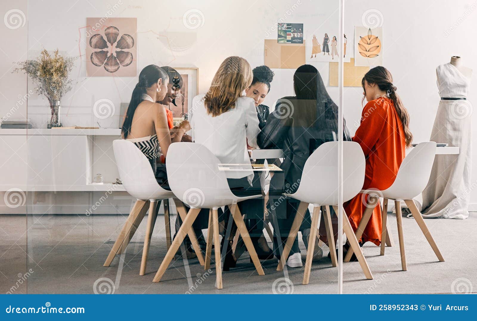 Work in Progress. a Group of Businesswomen in a Meeting at Work. Stock ...