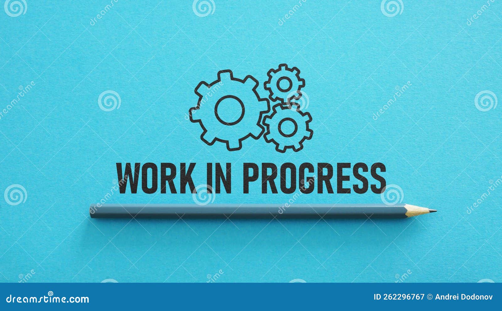 Work in Progress is Shown Using the Text and Picture of Gears Stock ...