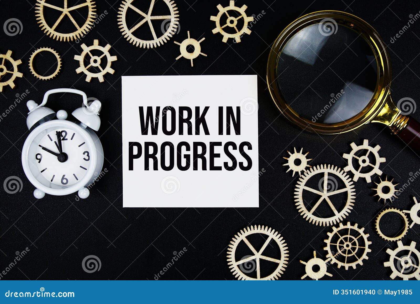 Work in Progress Text Message on Sticky Note with Magnifying Glass and ...