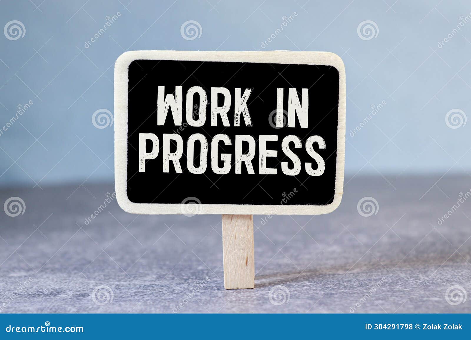 WORK in PROGRESS Text on Notebook with Chart and Calculator. Stock ...