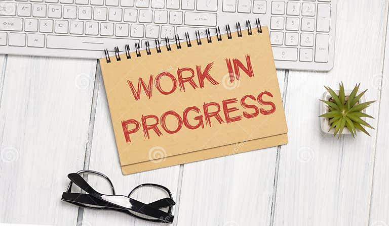 Work in Progress Text Written on a Notebook Stock Image - Image of ...