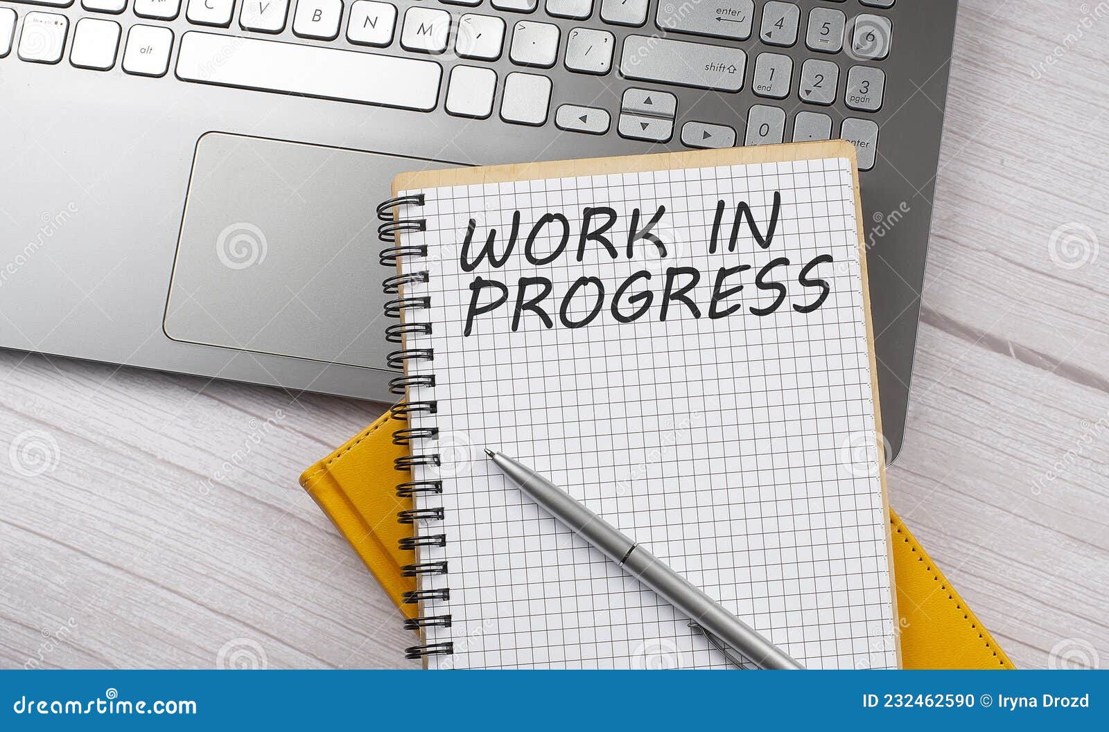 WORK in PROGRESS Text Written on a Notebook on the Laptop Stock Photo ...
