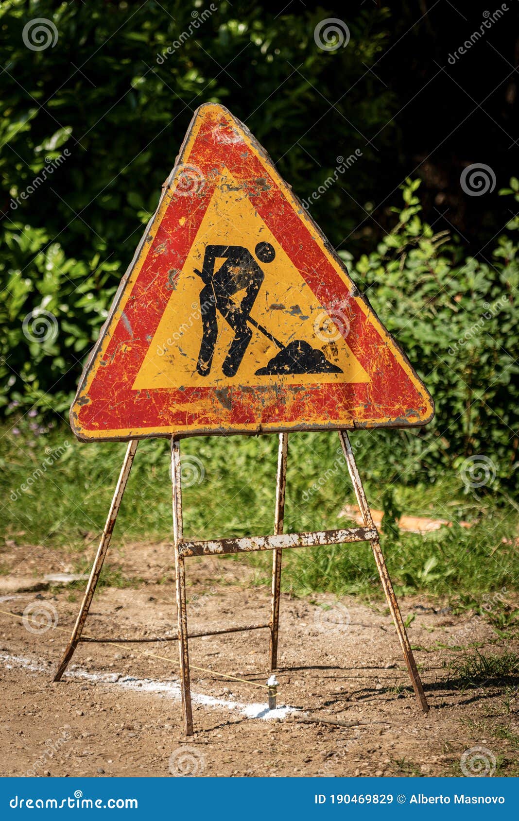 Work in Progress - Triangular Road Sign on the Roadside Stock Image ...