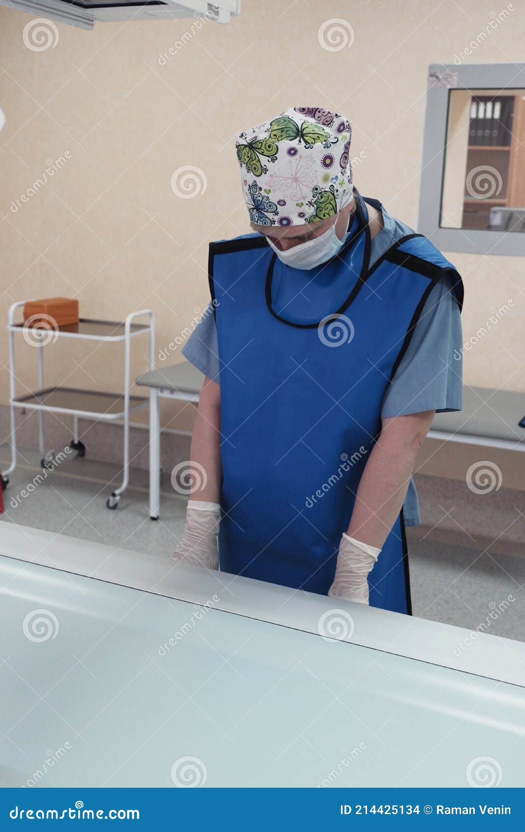 The Work of a Radiologist in the X-ray Room for Diagnostics. Stock ...