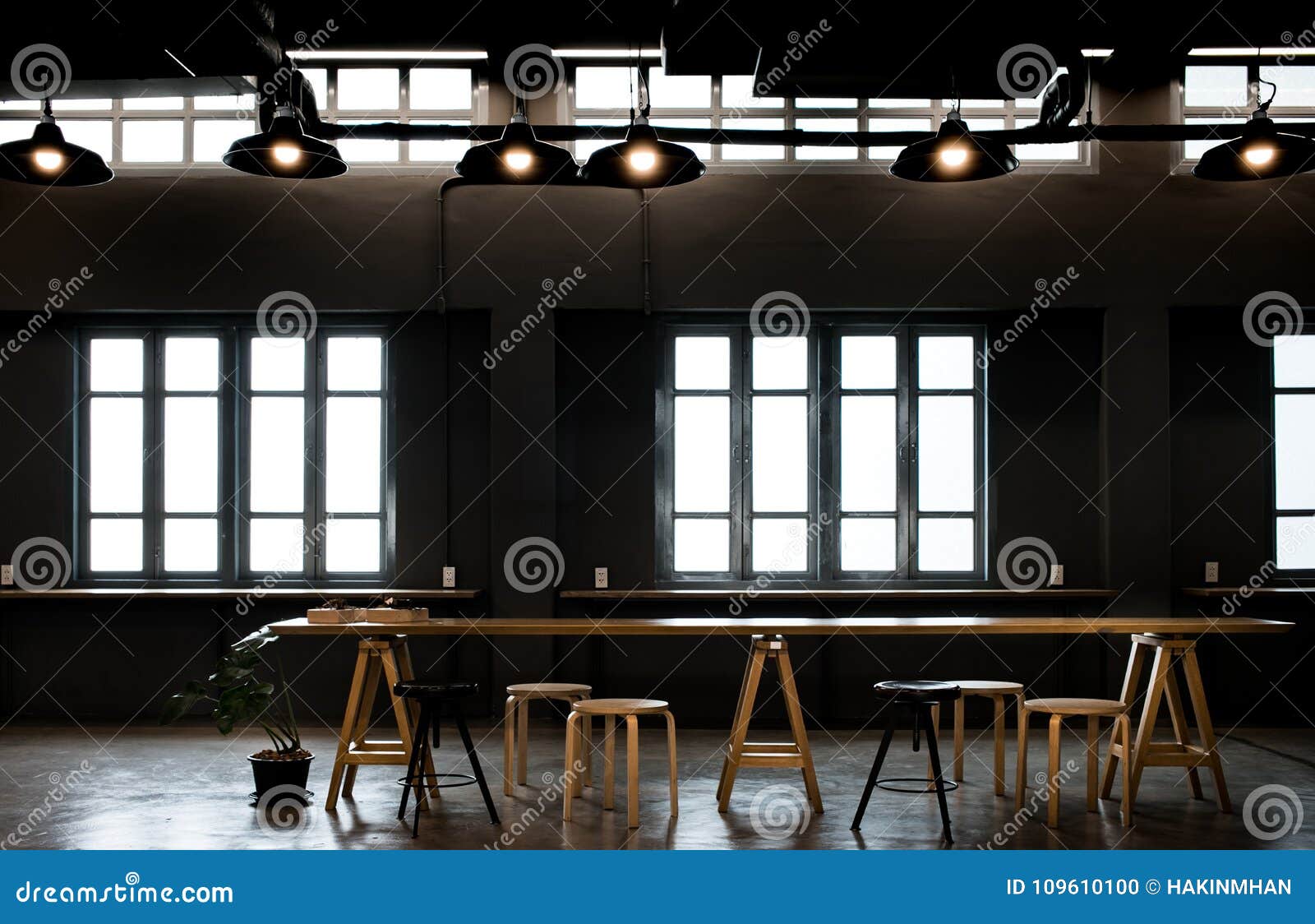 Work Table in Dark Loft Cafe Design with Window Stock Photo - Image of ...