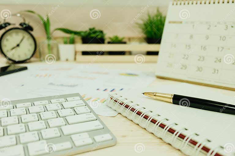 Work Table with Keyboard, Pen, Notebook Paper, Info Graph, Clock Stock ...
