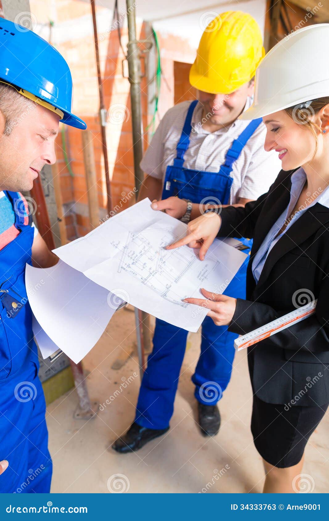 Work Team on Construction Site Controlling Floor Plan Stock Image ...