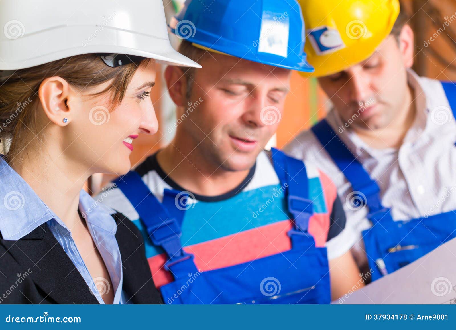 Work Team on Construction Site Controlling Floor Plan Stock Photo ...