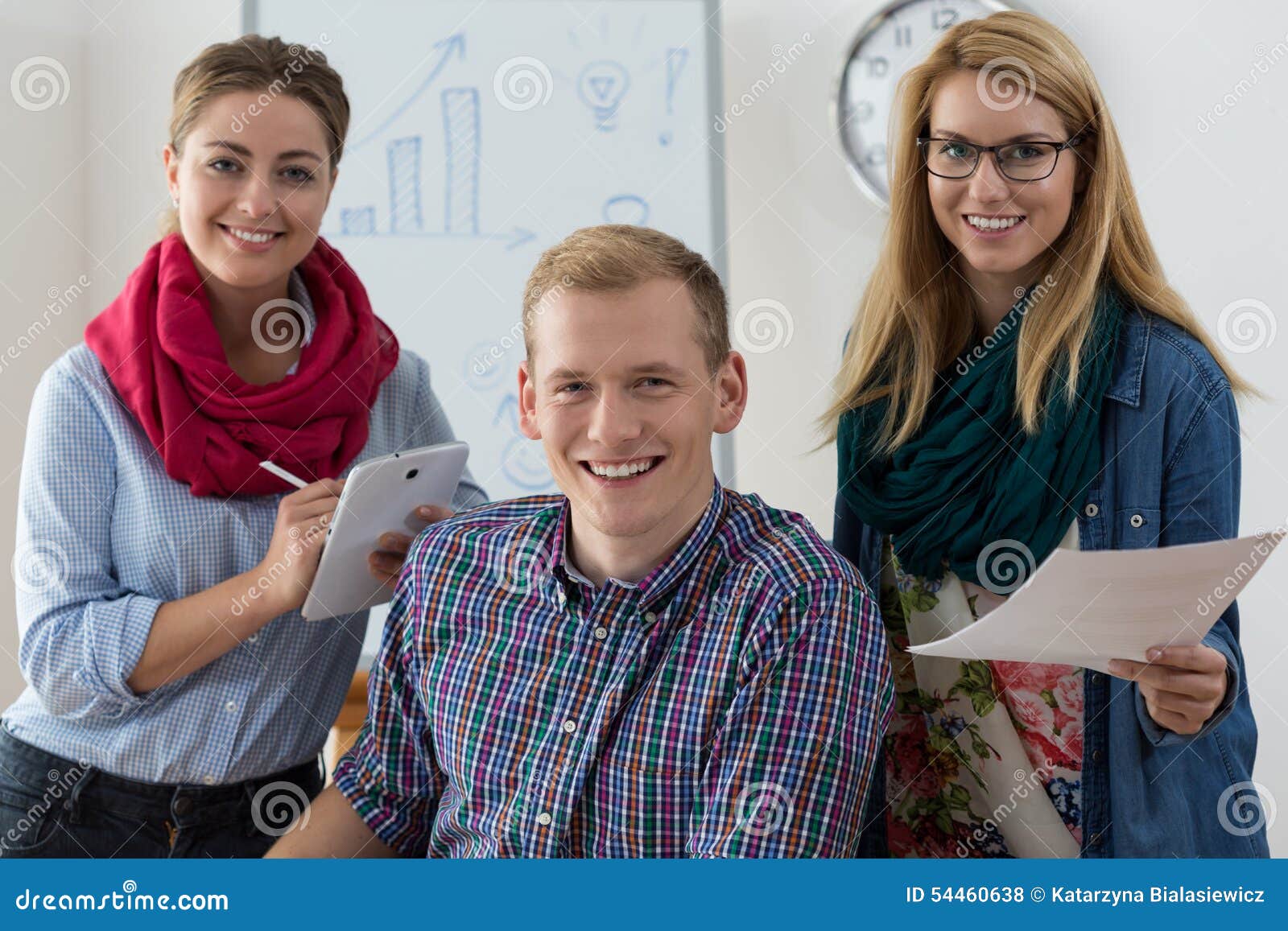 Work team of young adults stock photo. Image of paper - 54460638