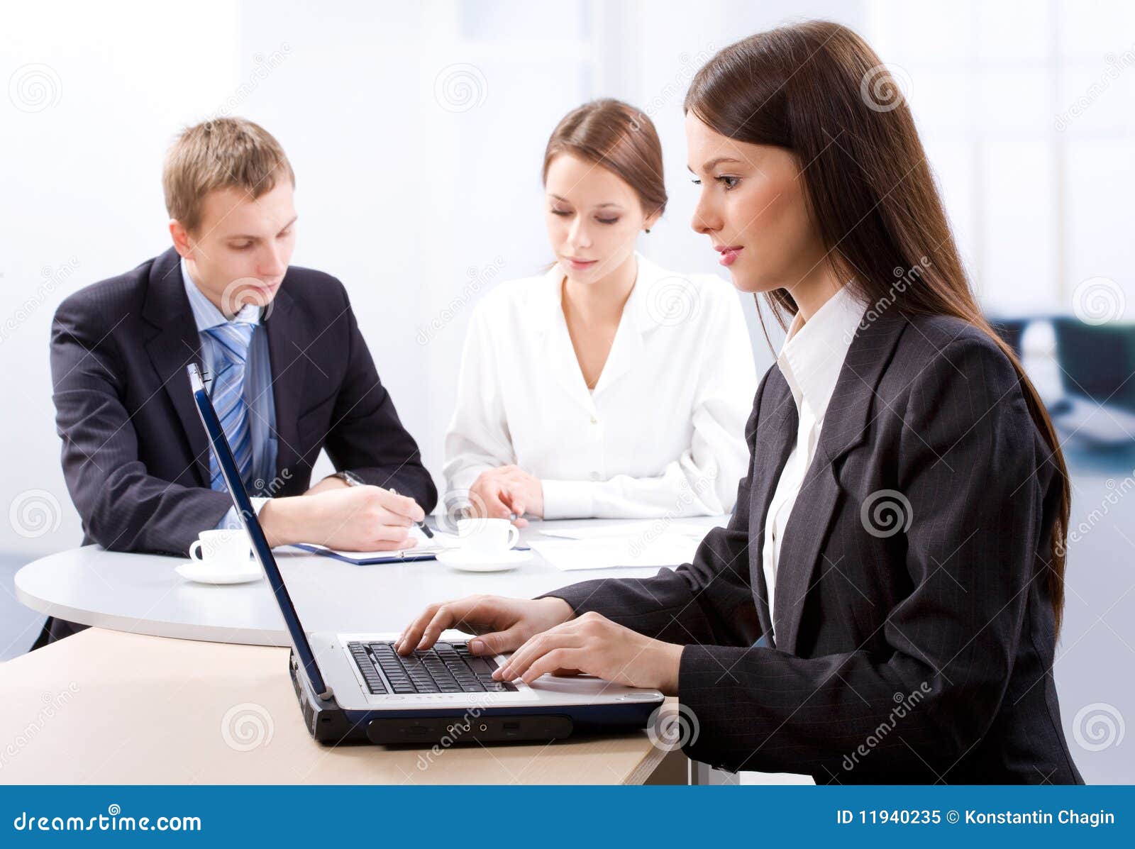 The Work of Three Business People Stock Image - Image of laptop ...