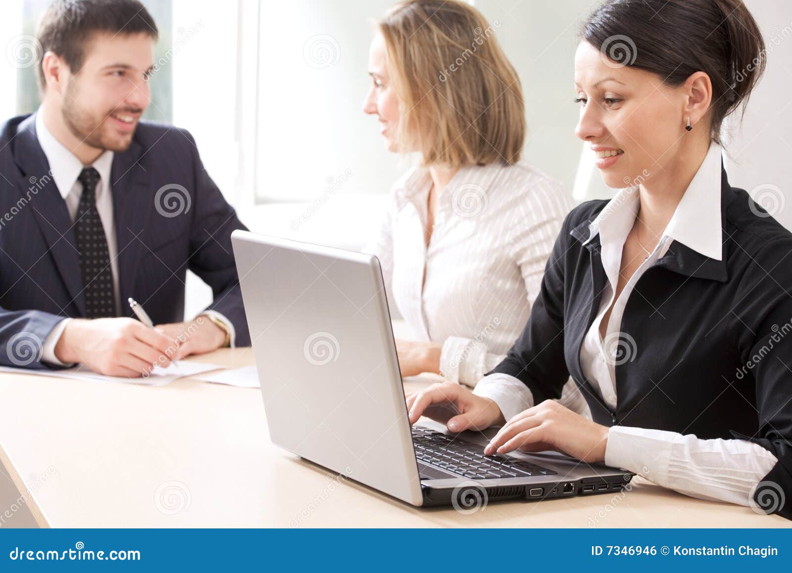 The Work of Three Business People Stock Photo - Image of businessman ...