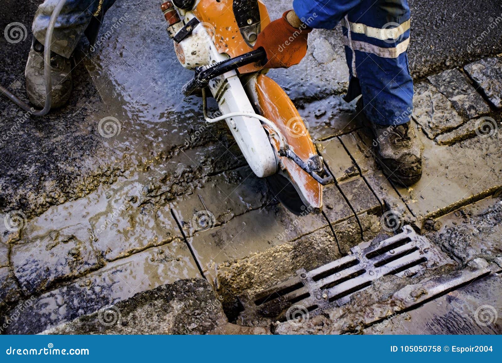 Work To Update the Road Coverage.a Circular Saw Cuts the Pavement Slabs ...