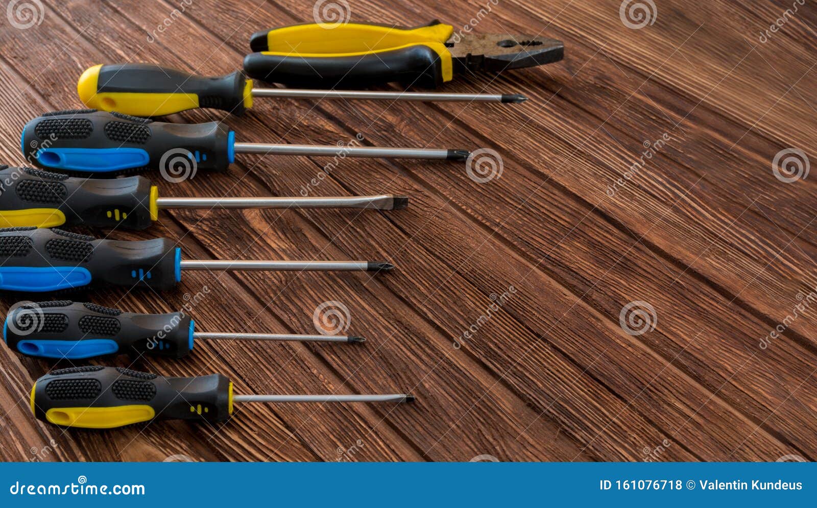 Work Tool of the Wizard. Different Screwdrivers on a Wooden Surface ...