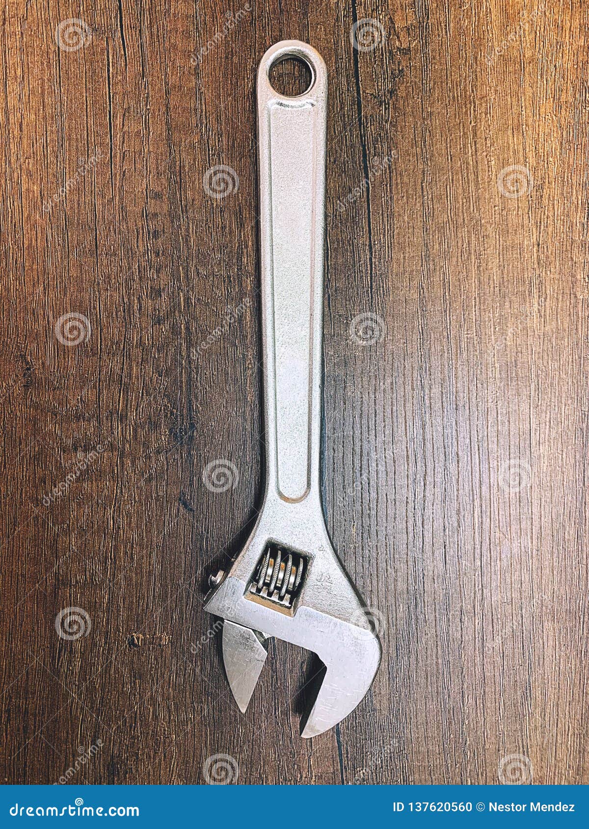 Work Tools, Adjustable Hand Wrench, on a Wooden Table Stock Photo ...