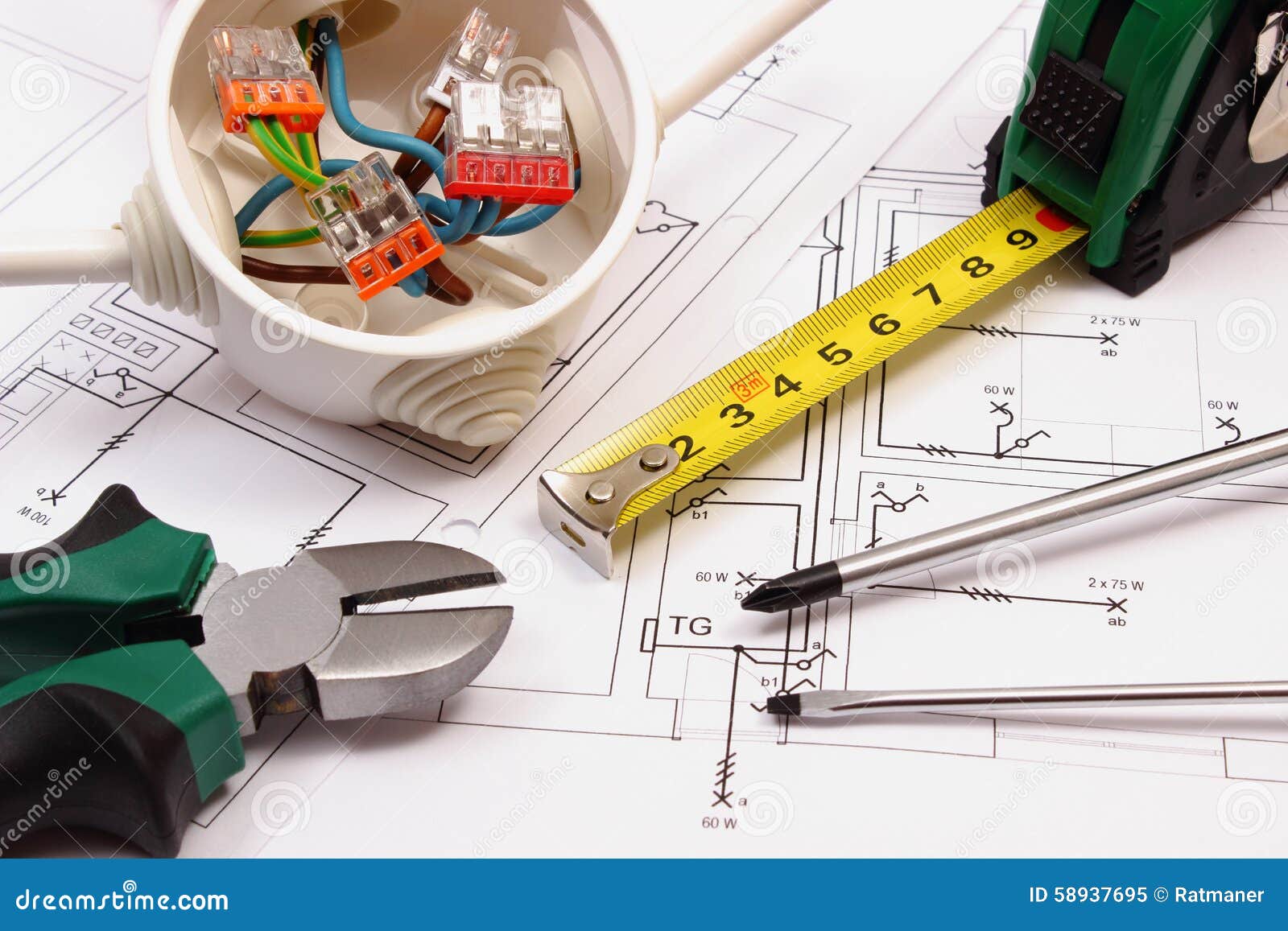 Work Tools and Electrical Box with Cables on Construction Drawing of ...