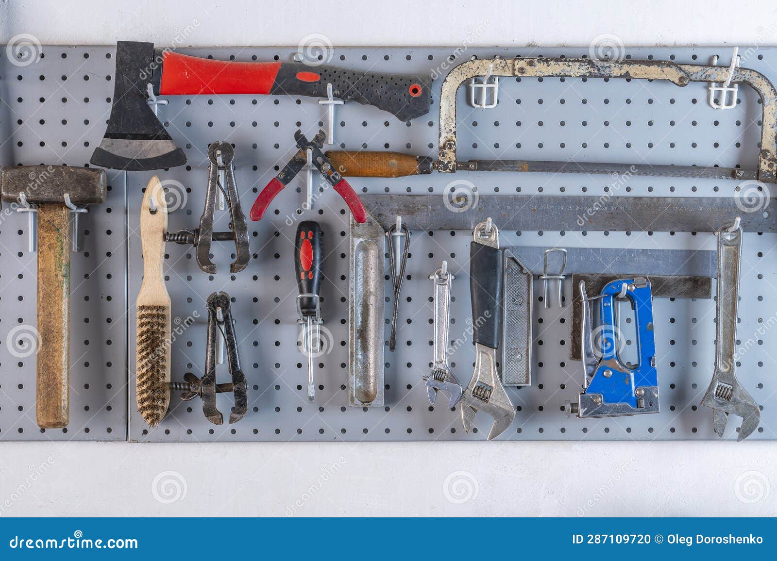 Work Tools Hanging on Steel Wall As Background in Workshop, Closeup ...