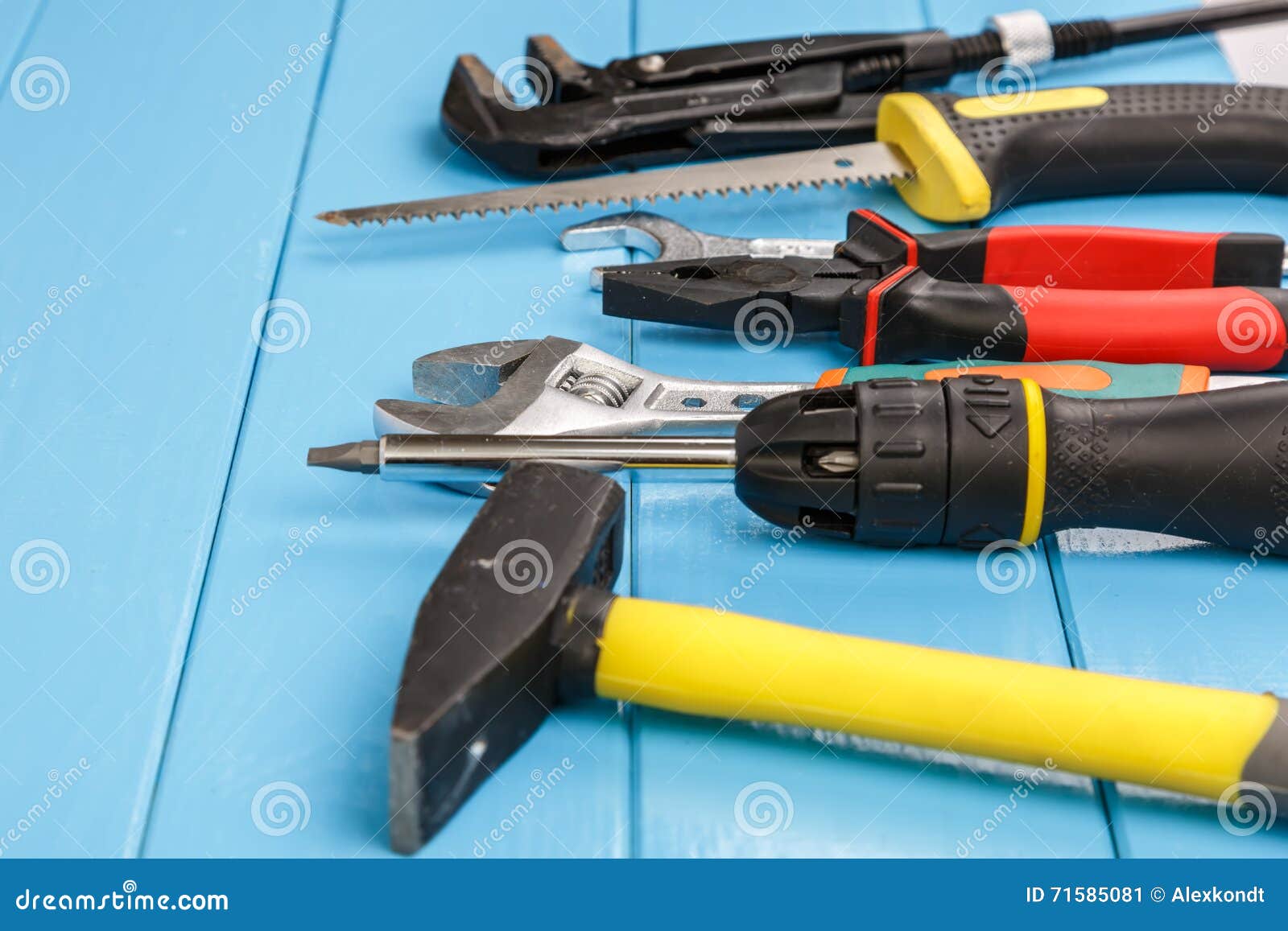 Work Tools Laying on Blue Wooden Background Stock Image - Image of ...