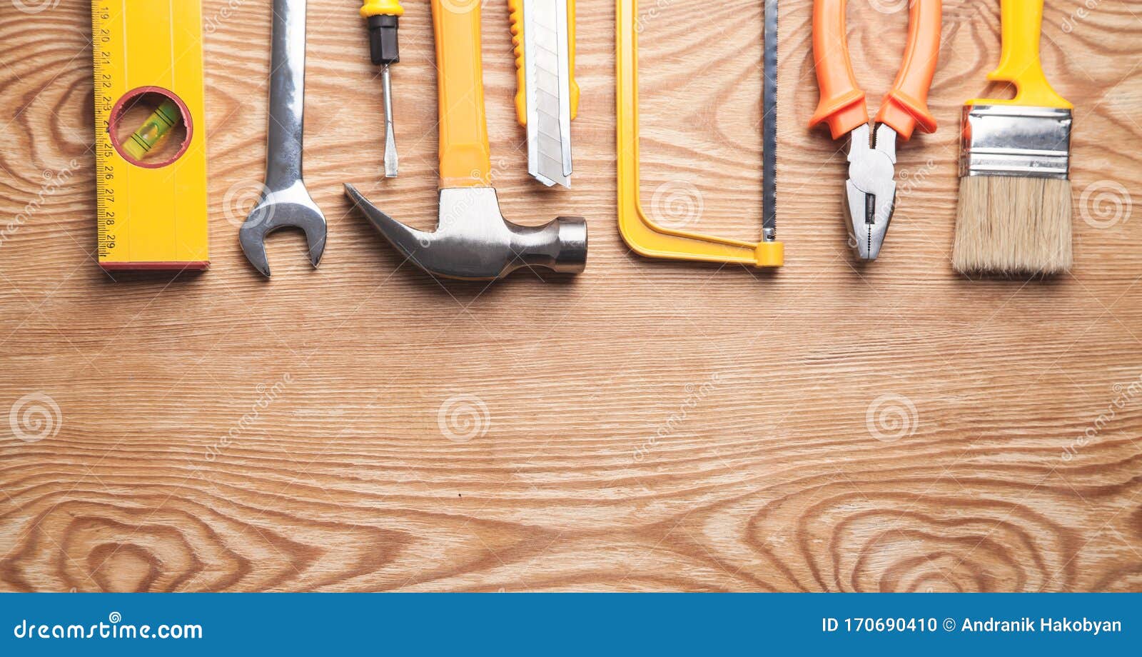 Work Tools on Wooden Background Stock Photo - Image of yellow, hammer ...