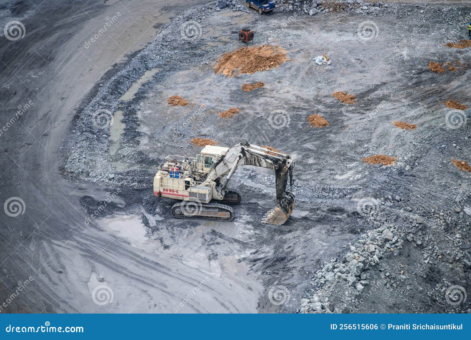 Work of Trucks and the Excavator in an Open Pit on Gold Mining Stock ...