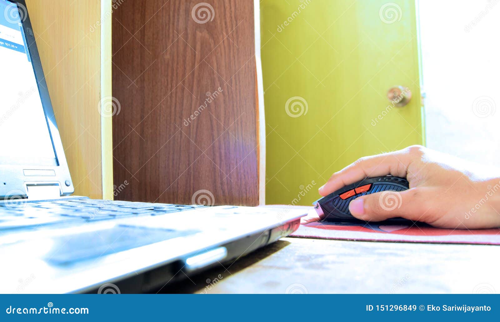 Work Using a Laptop. the Hand Holding the Mouse, Working on the Task of ...