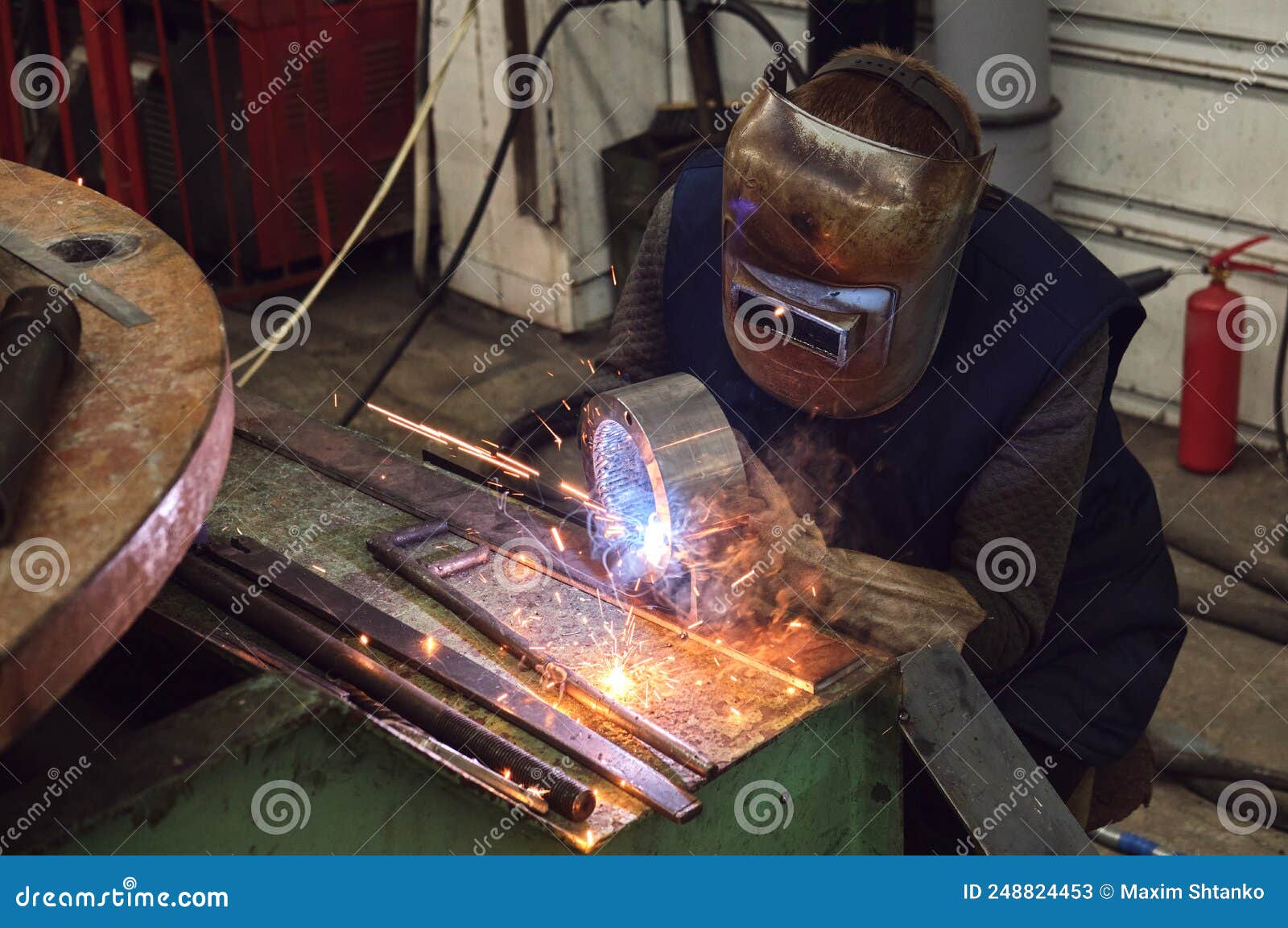 Work of a Welder, in a Chrome Welding Helmet Stock Image - Image of ...