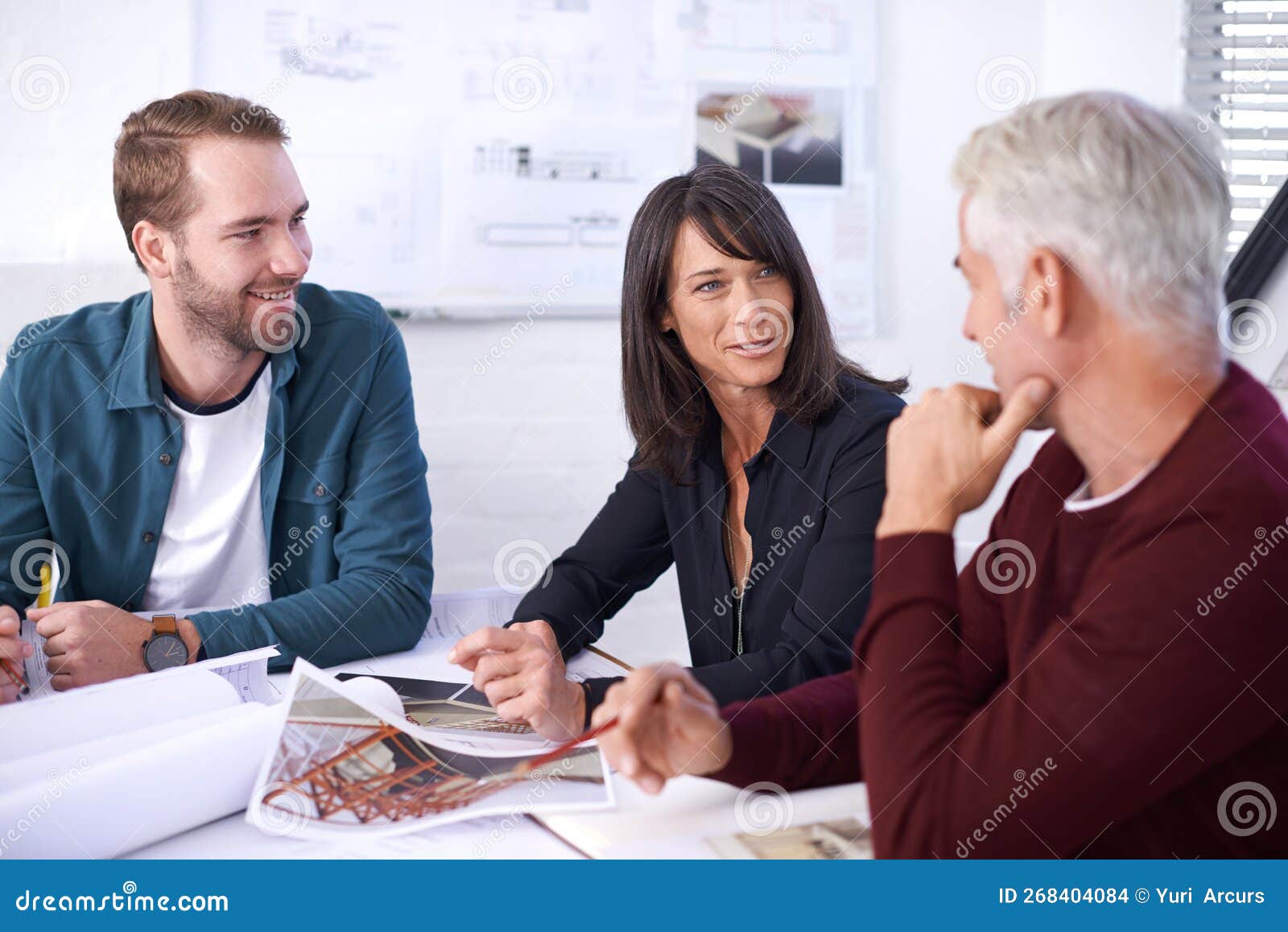 They always Work Well Together. Three Architects Working on a New ...