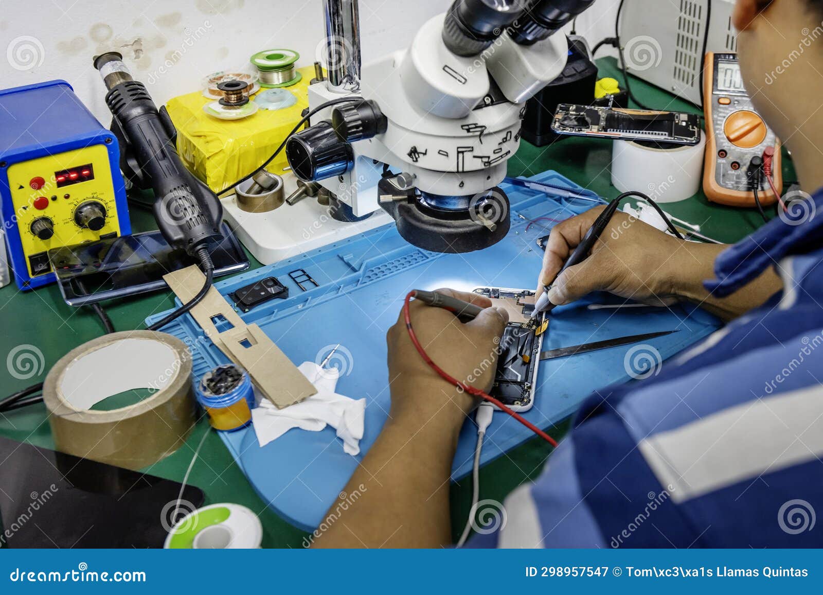 Workbench of a Mobile Phone Repair Technician in Which Working with a ...