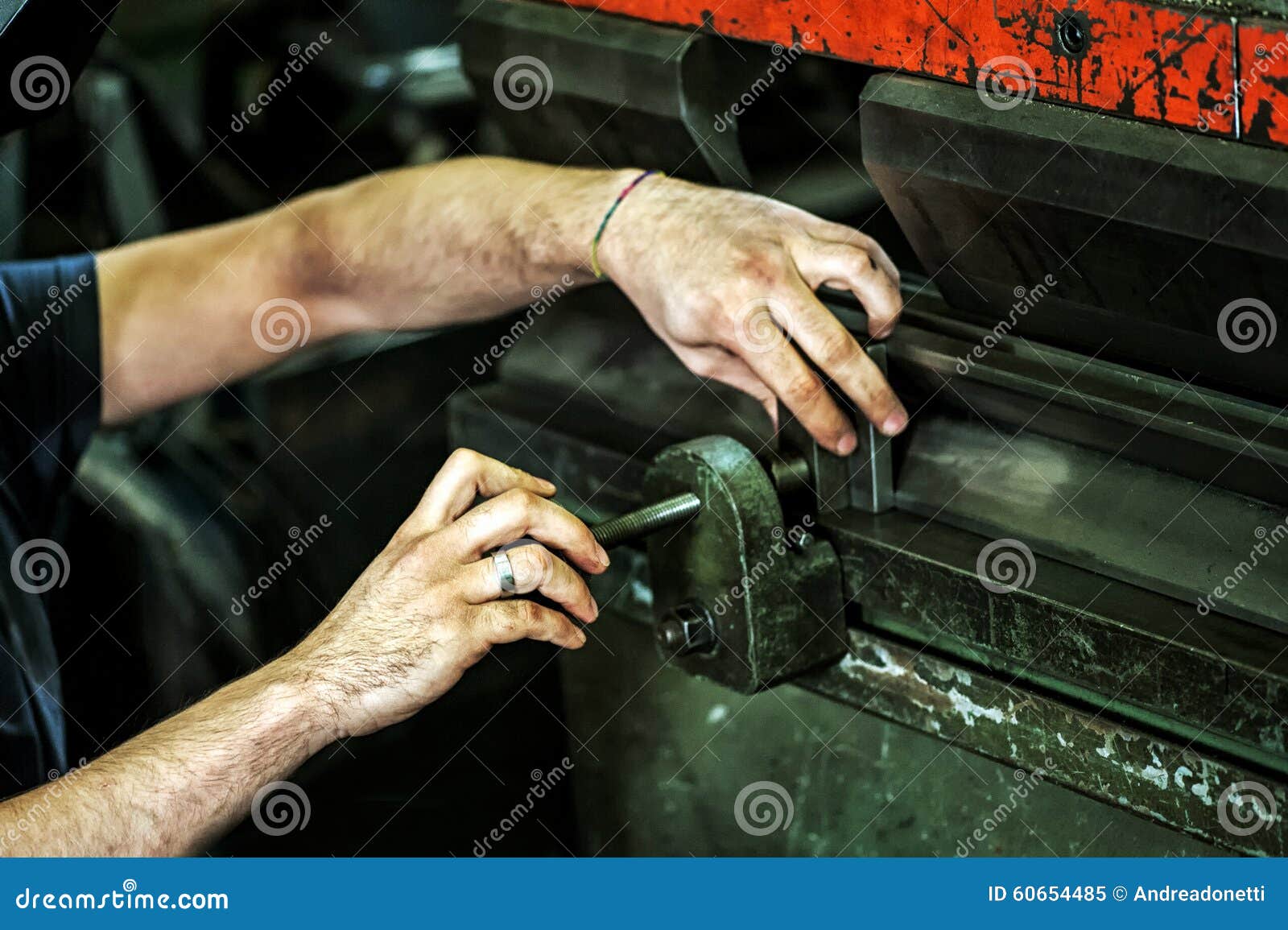 Worker Adjusting an Industrial Machine Stock Image - Image of artisan ...