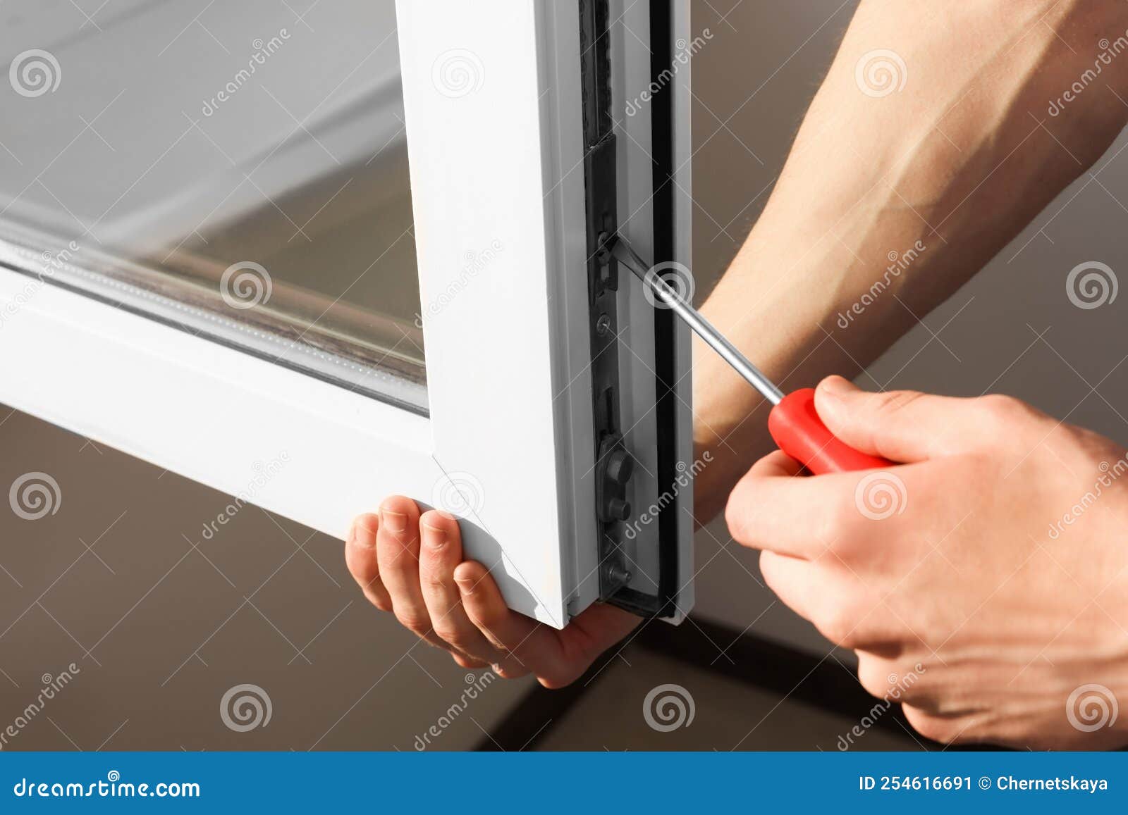 Worker Adjusting Installed Window with Screwdriver, Closeup Stock Image ...