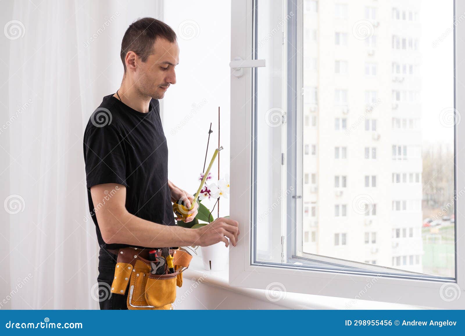 Worker Adjusting Installed Window with Screwdriver Indoors, Closeup ...
