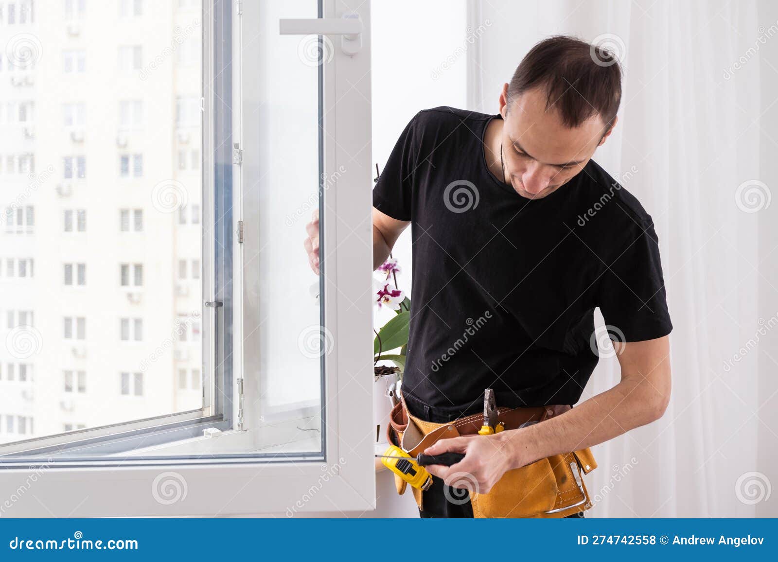 Worker Adjusting Installed Window with Screwdriver Indoors, Closeup ...