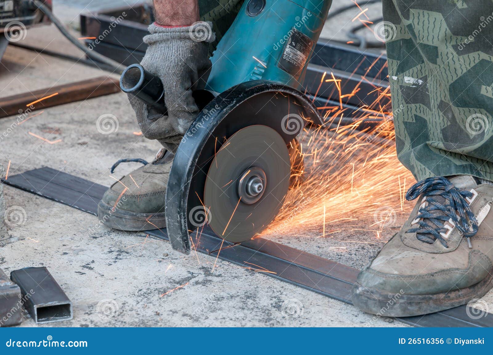 Worker with angle grinder stock photo. Image of protection - 26516356