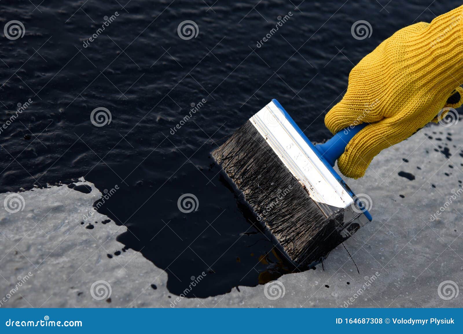 Worker Applies Bitumen Mastic on the Foundation Stock Photo - Image of ...