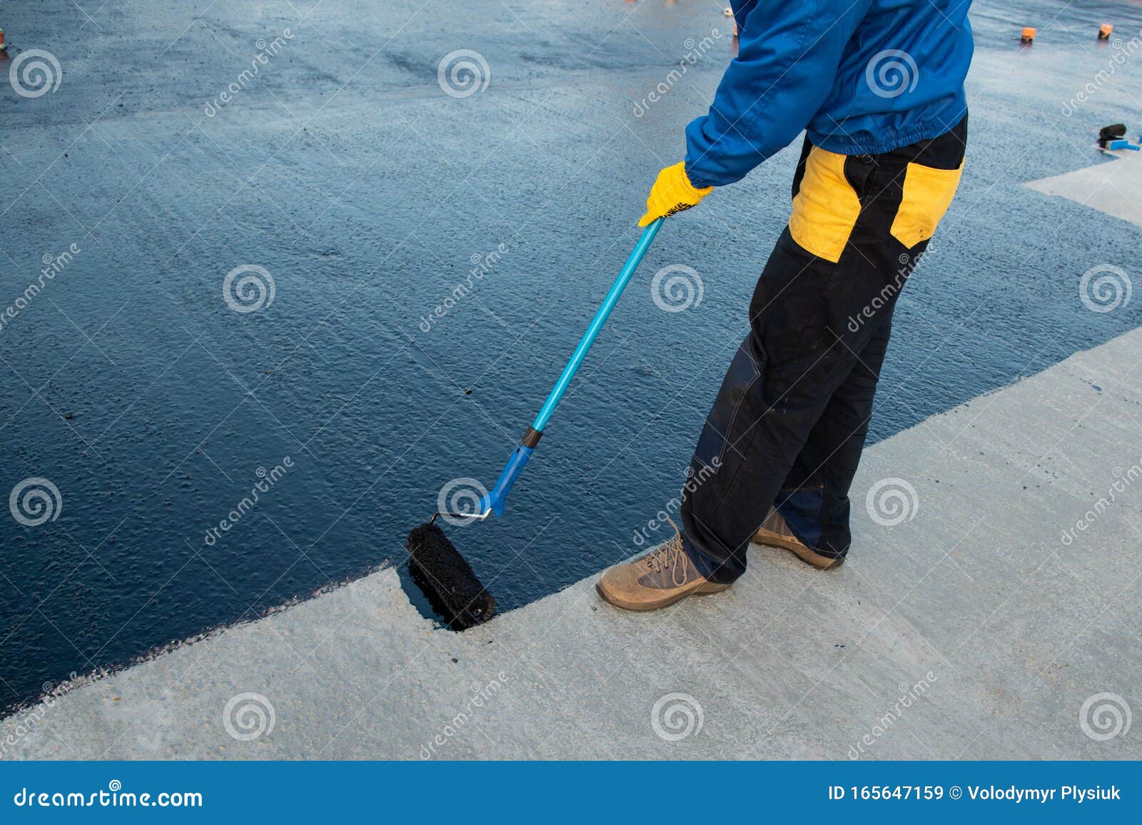 Worker Applies Bitumen Mastic on the Foundation Stock Image - Image of ...