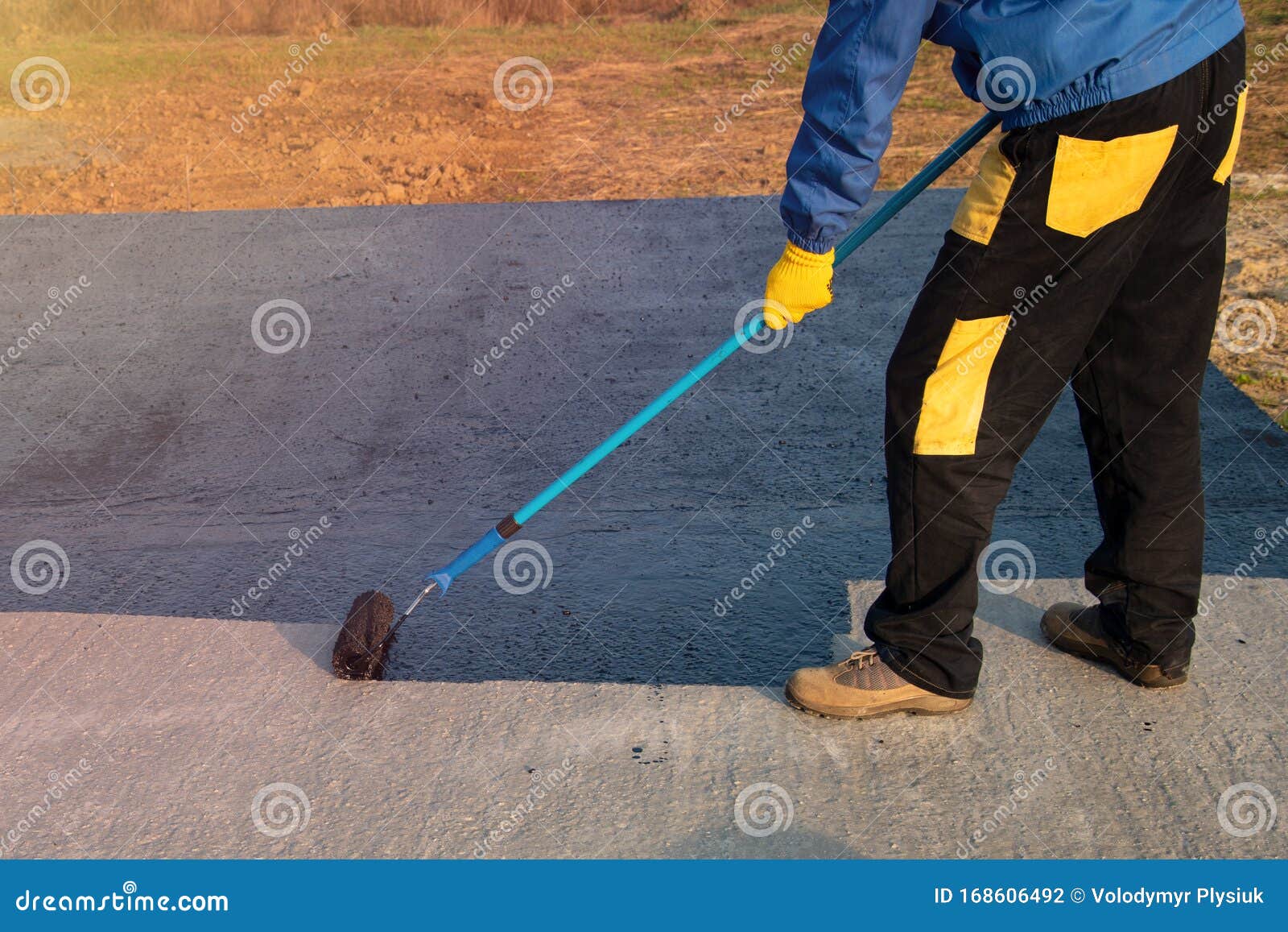 Worker Applies Bitumen Mastic on the Foundation Stock Photo - Image of ...