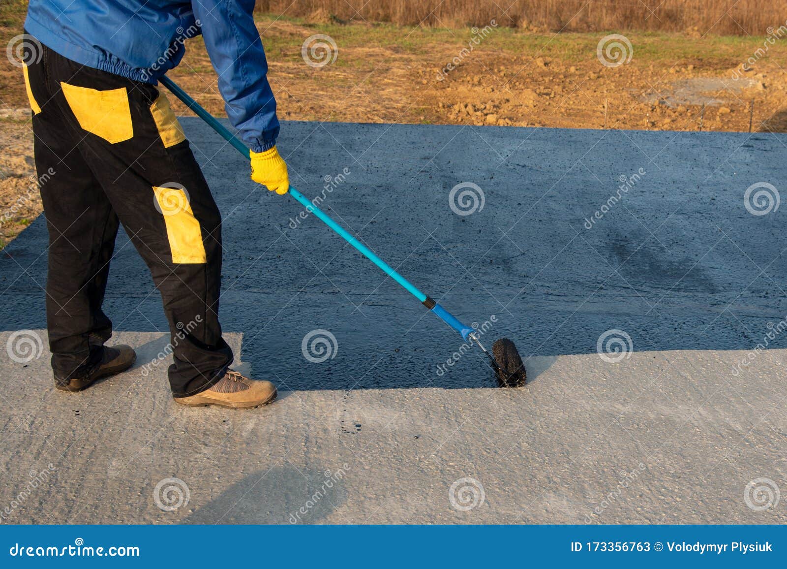 Worker Applies Bitumen Mastic on the Foundation Stock Image - Image of ...