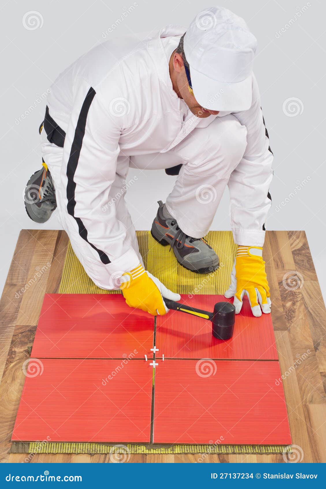 Worker Applies Ceramic Tiles Stock Photo - Image of home, grout: 27137234