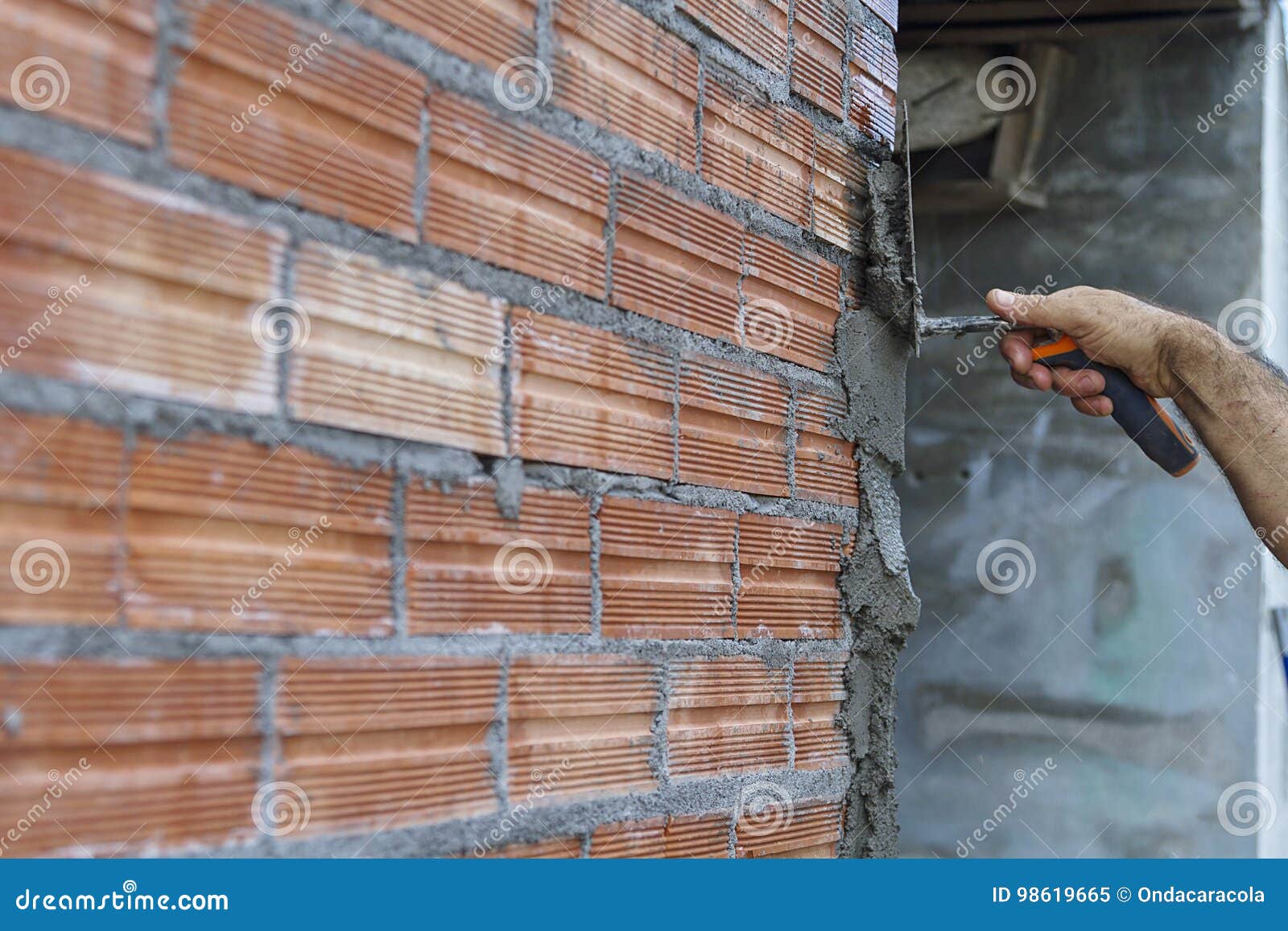 Applying cement stock image. Image of architecture, masonry - 98619665